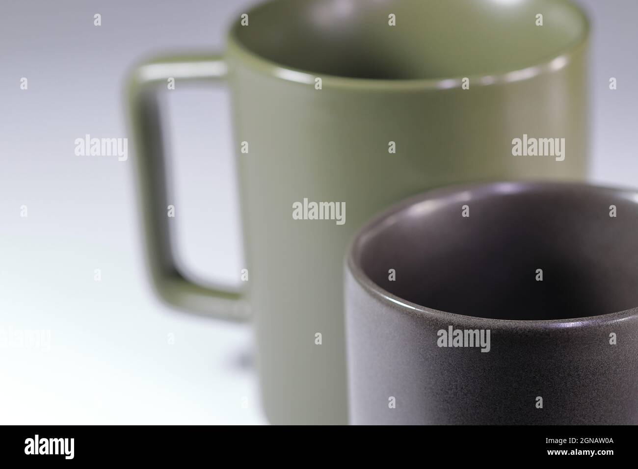 close up black and Green ceramic mug. empty black and green tea or ...