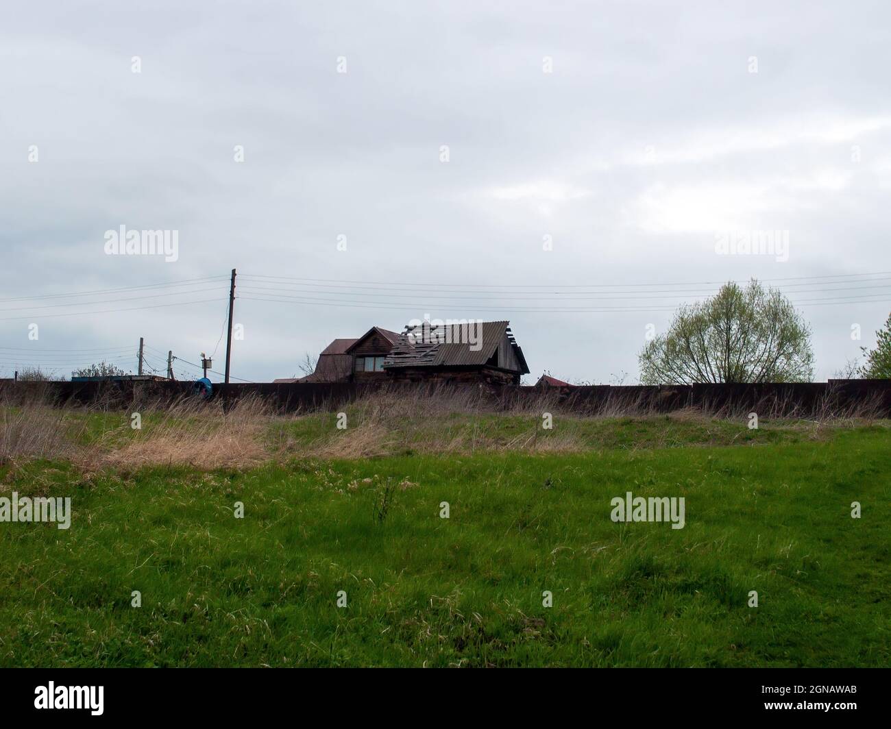 old wooden houses in the village, in spring Stock Photo - Alamy