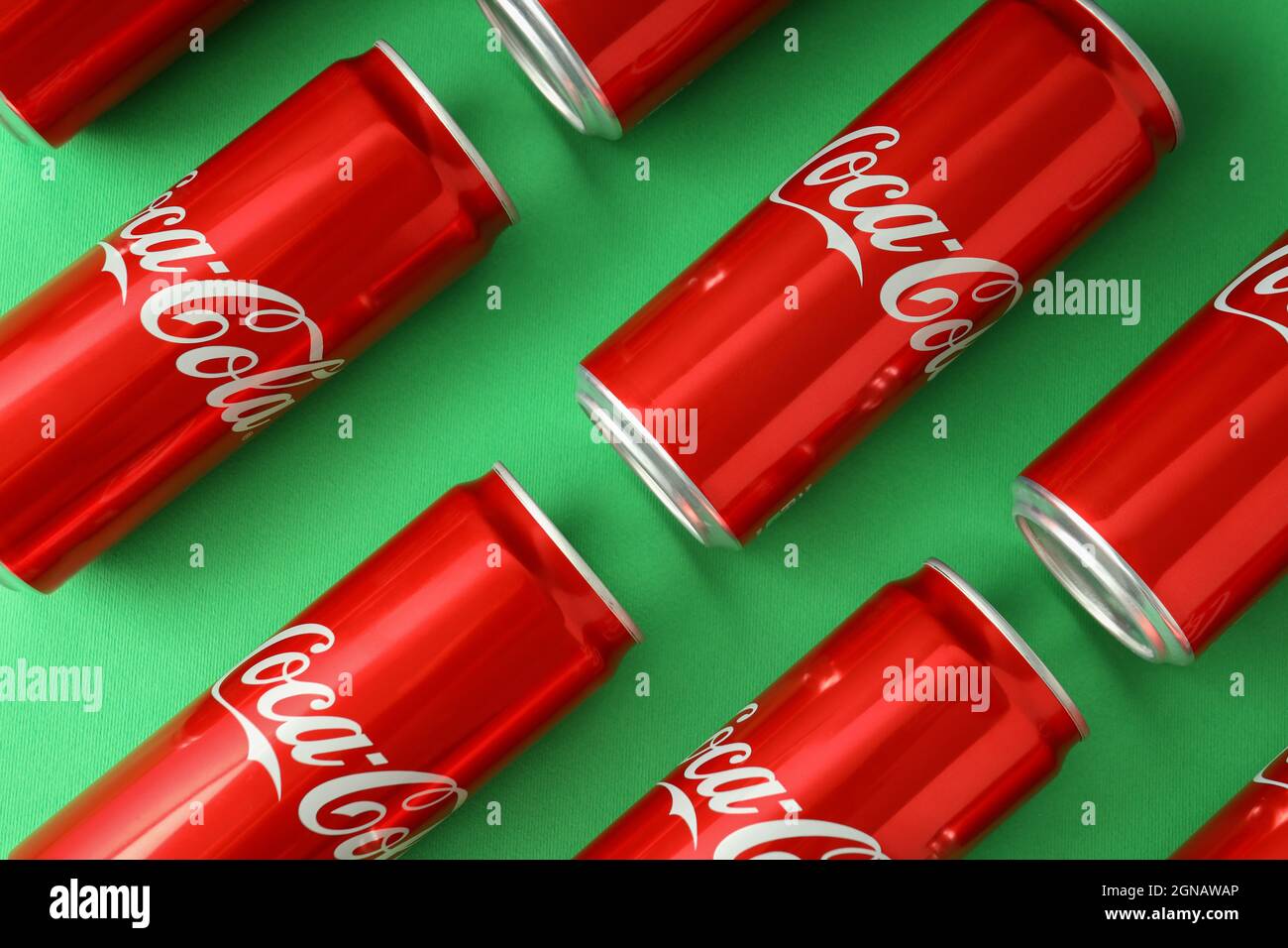 Odessa, Ukraine - September 23, 2021: Coca - cola cans on green ...