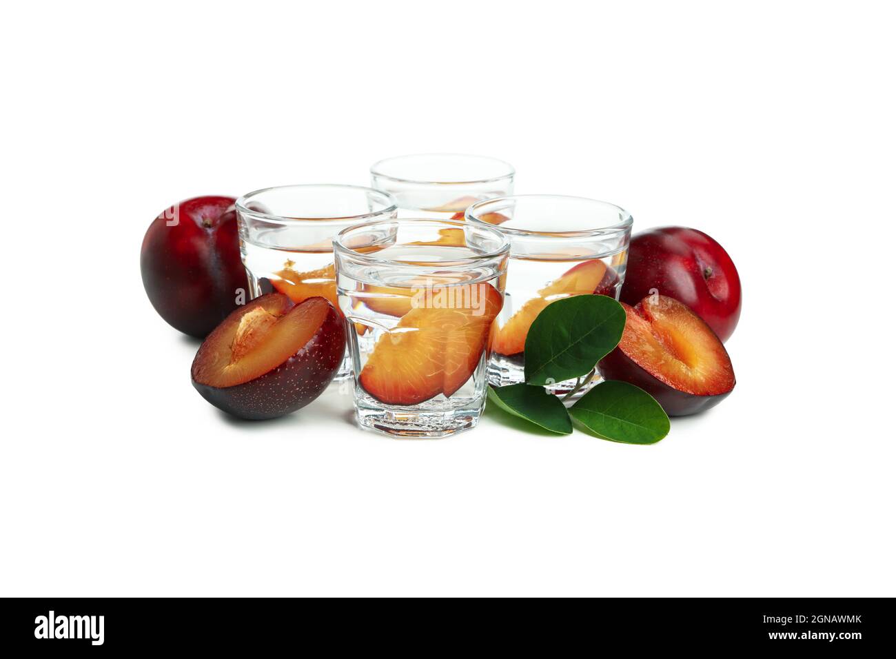 Plum vodka shots isolated on white background Stock Photo - Alamy