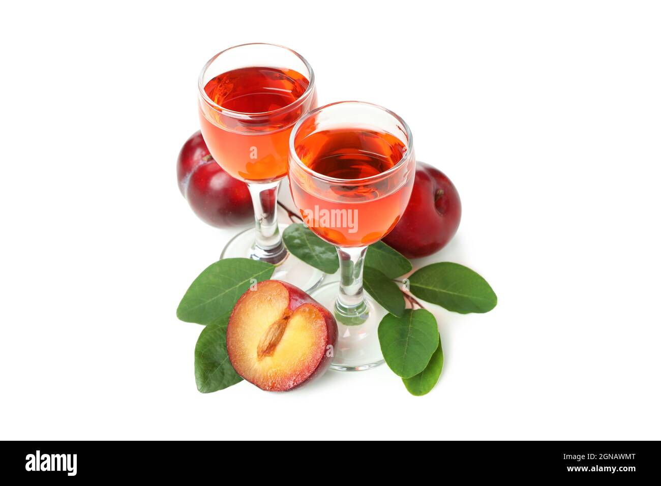 Plum brandy shots isolated on white background Stock Photo - Alamy
