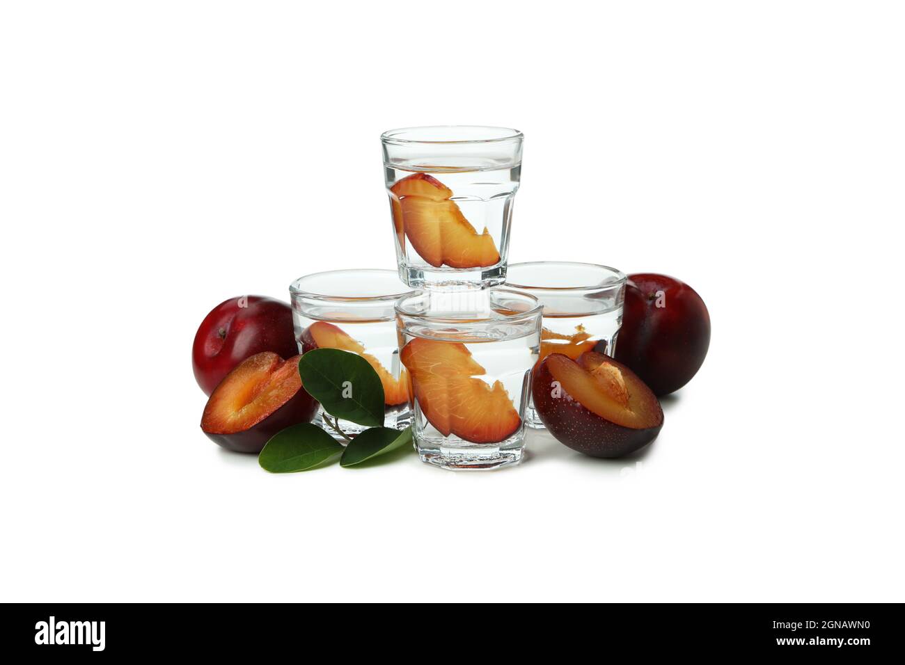 Plum vodka shots isolated on white background Stock Photo - Alamy