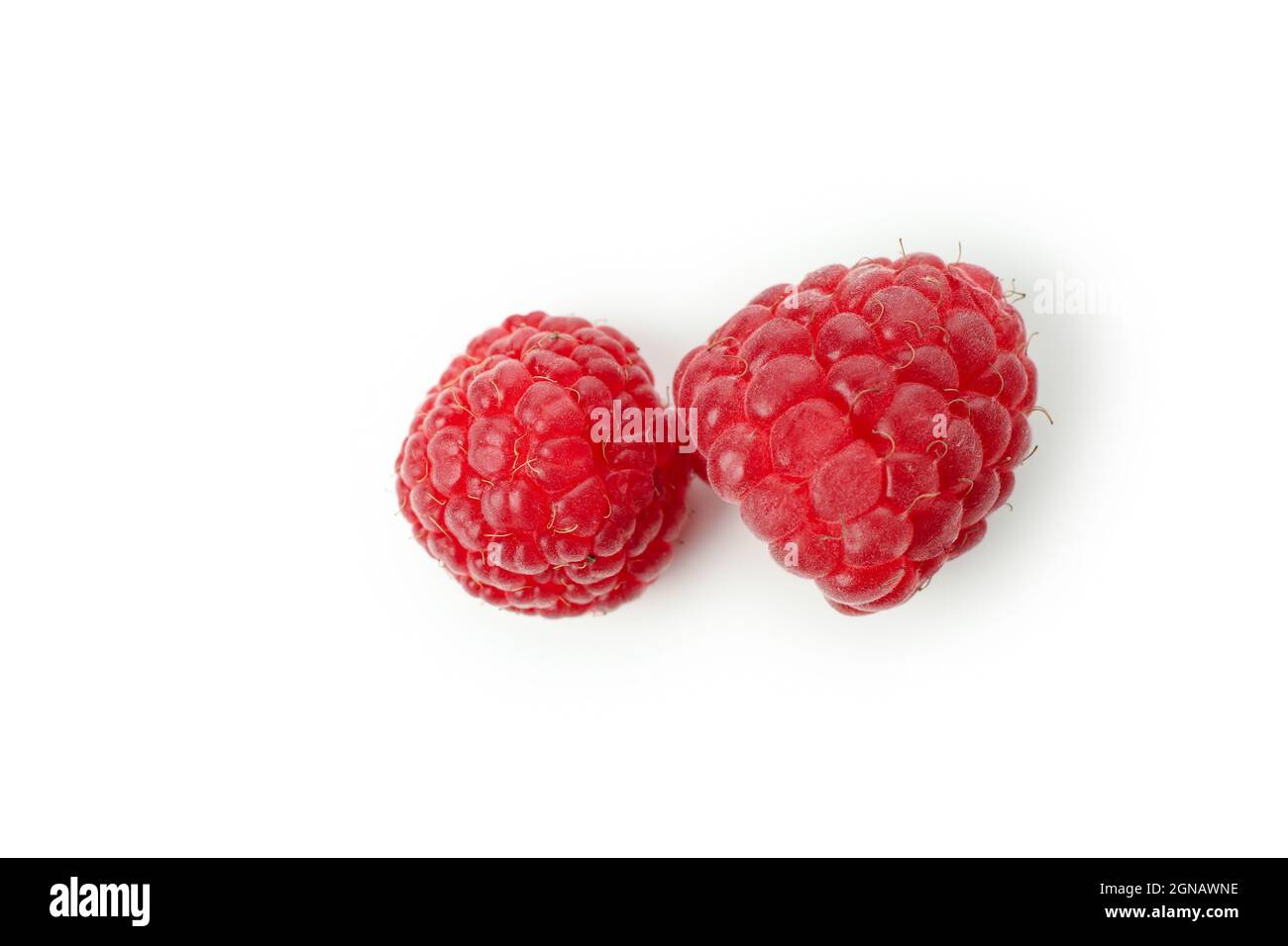 Red juicy raspberry, isolated on white background Stock Photo - Alamy