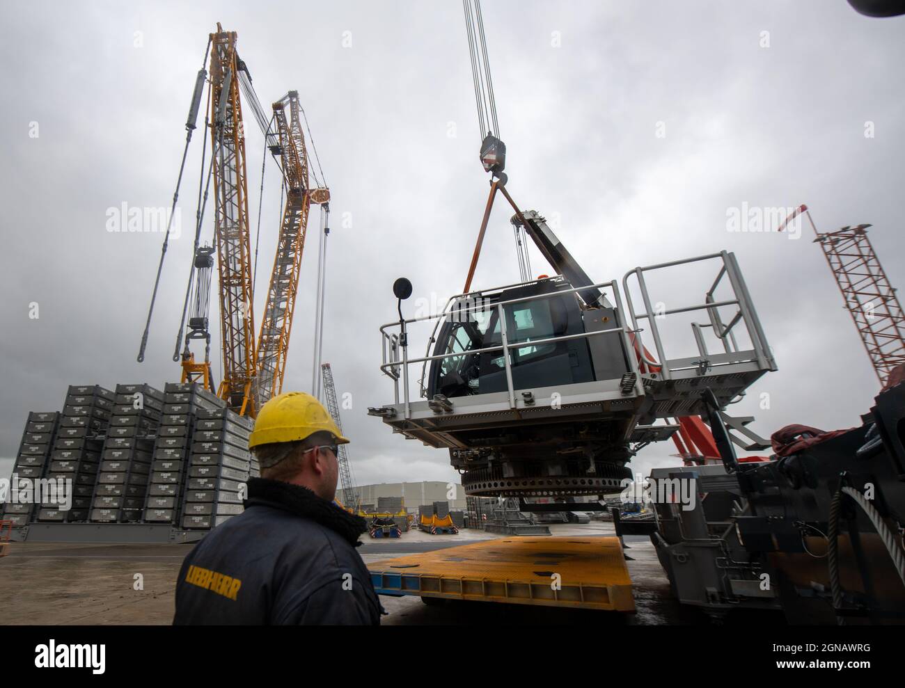 Ehingen, Germany. 26th Aug, 2021. Cranes are used to move the operator ...