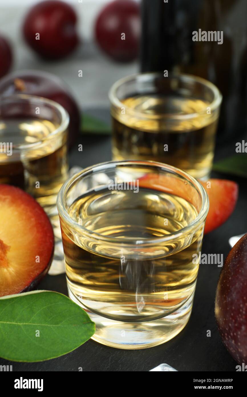 Concept of alcohol with plum vodka, close up Stock Photo - Alamy