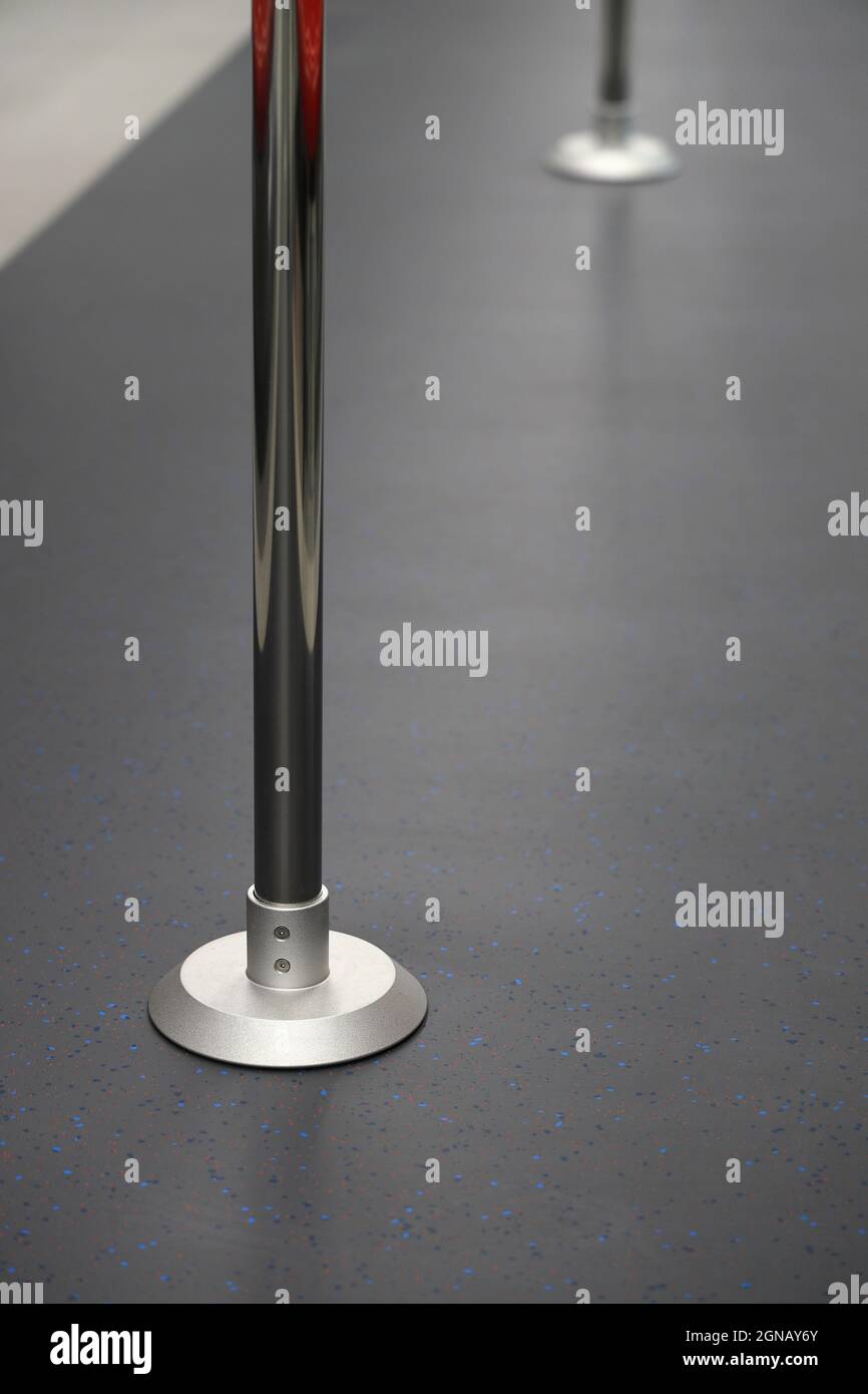closeup holding handrail ( grip ) for standing passengers fix on floor ...