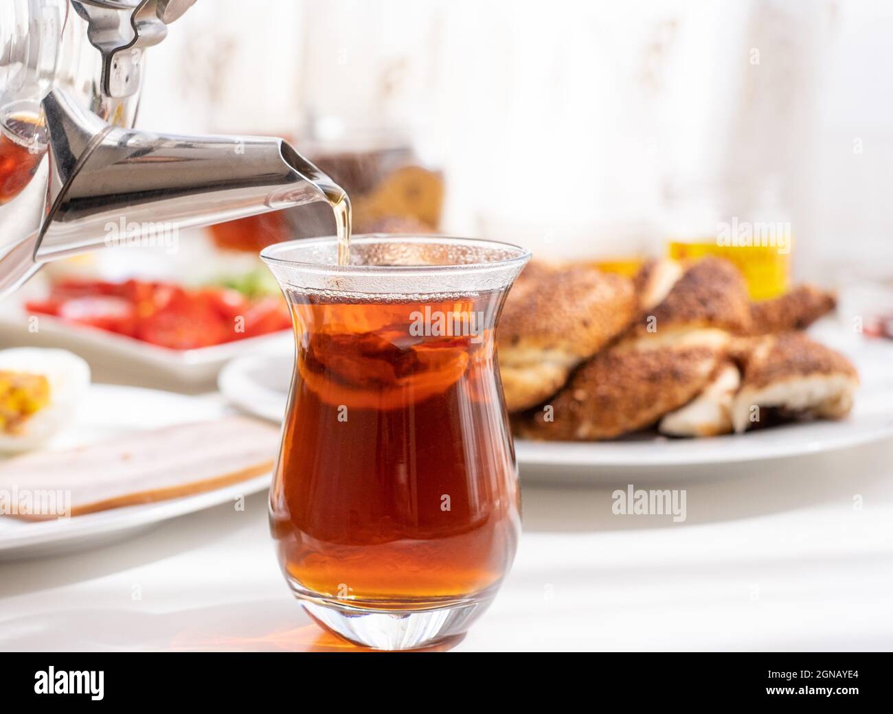 Pouring tea into glass hi-res stock photography and images - Alamy