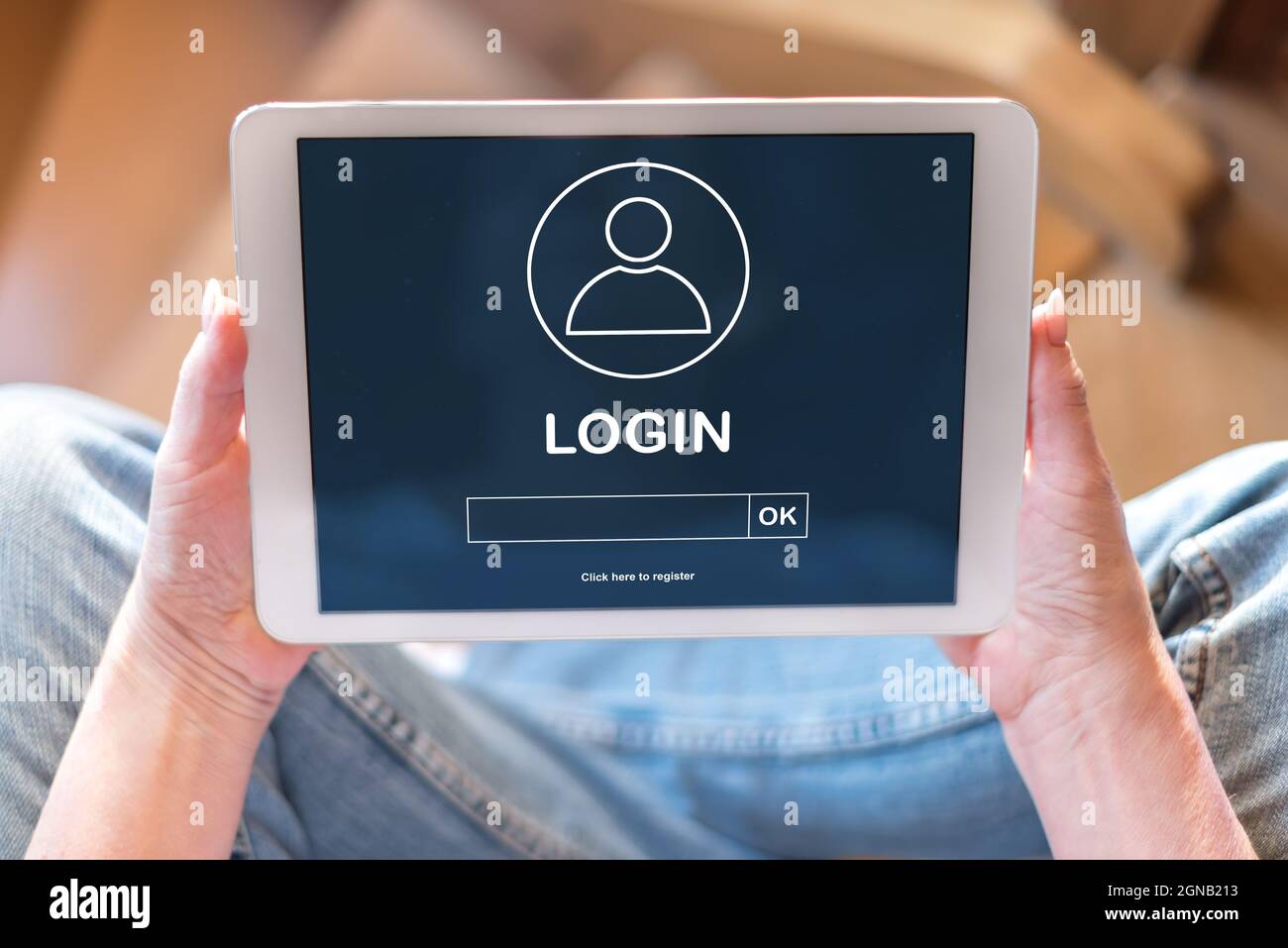 Tablet screen displaying a login concept Stock Photo - Alamy