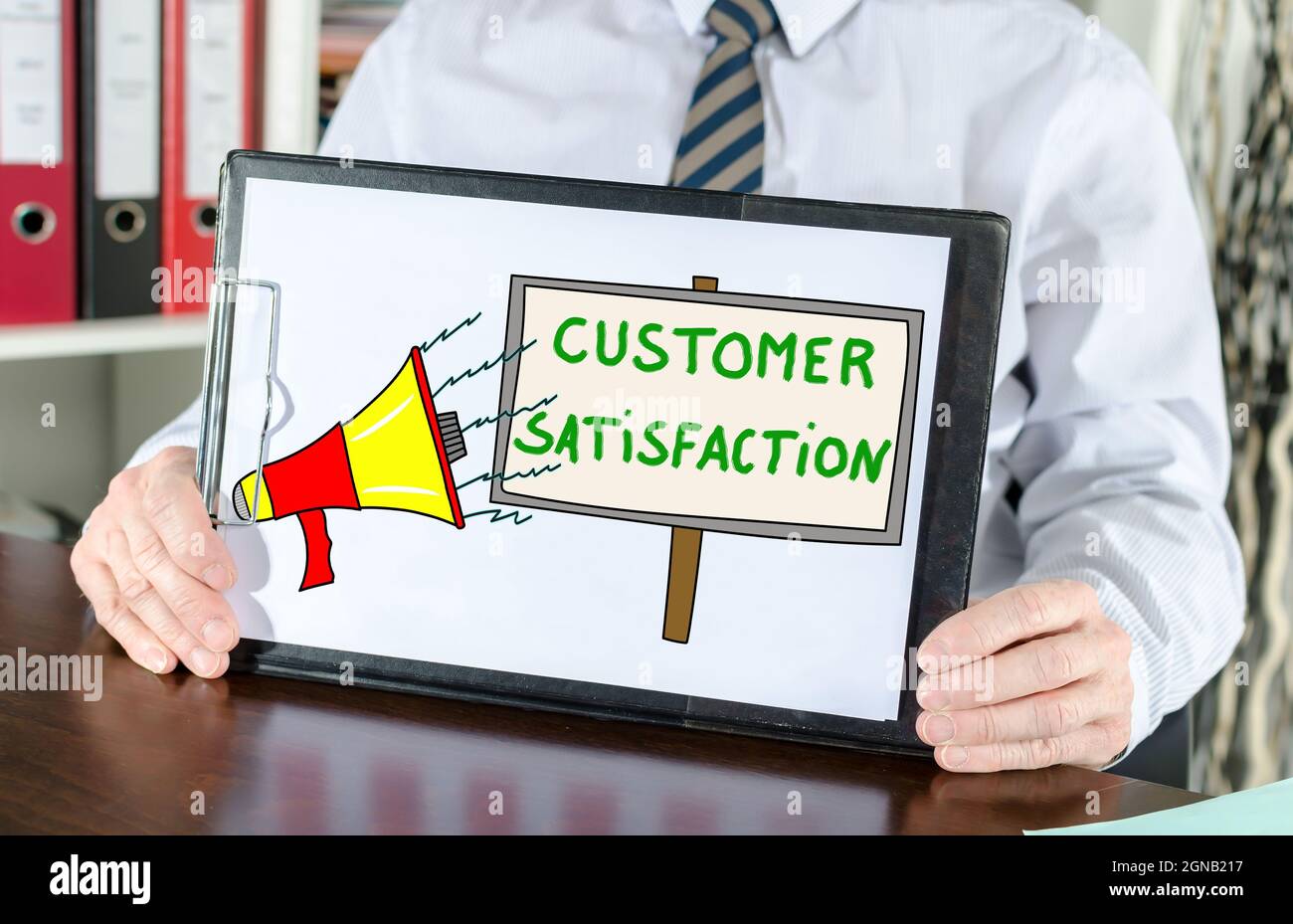 Customer satisfaction concept shown by a businessman Stock Photo - Alamy
