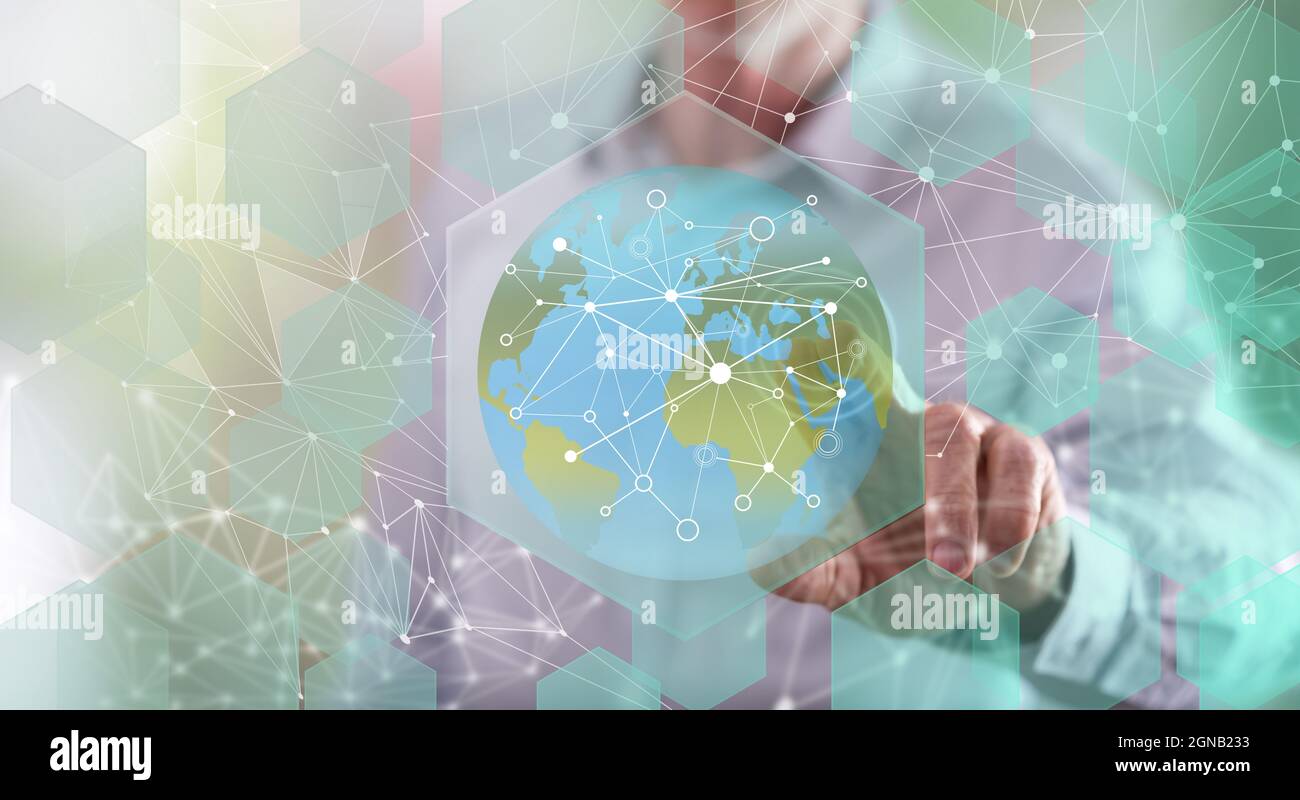 Man touching a global connection concept on a touch screen with his ...