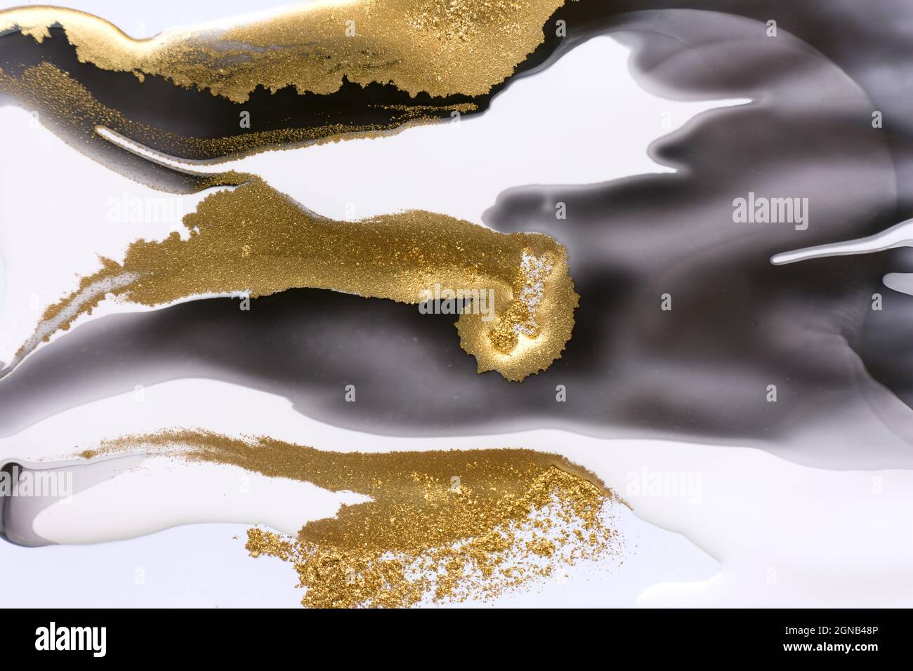 Gold spots on white and black smudges of paint. Abstract pattern Stock ...