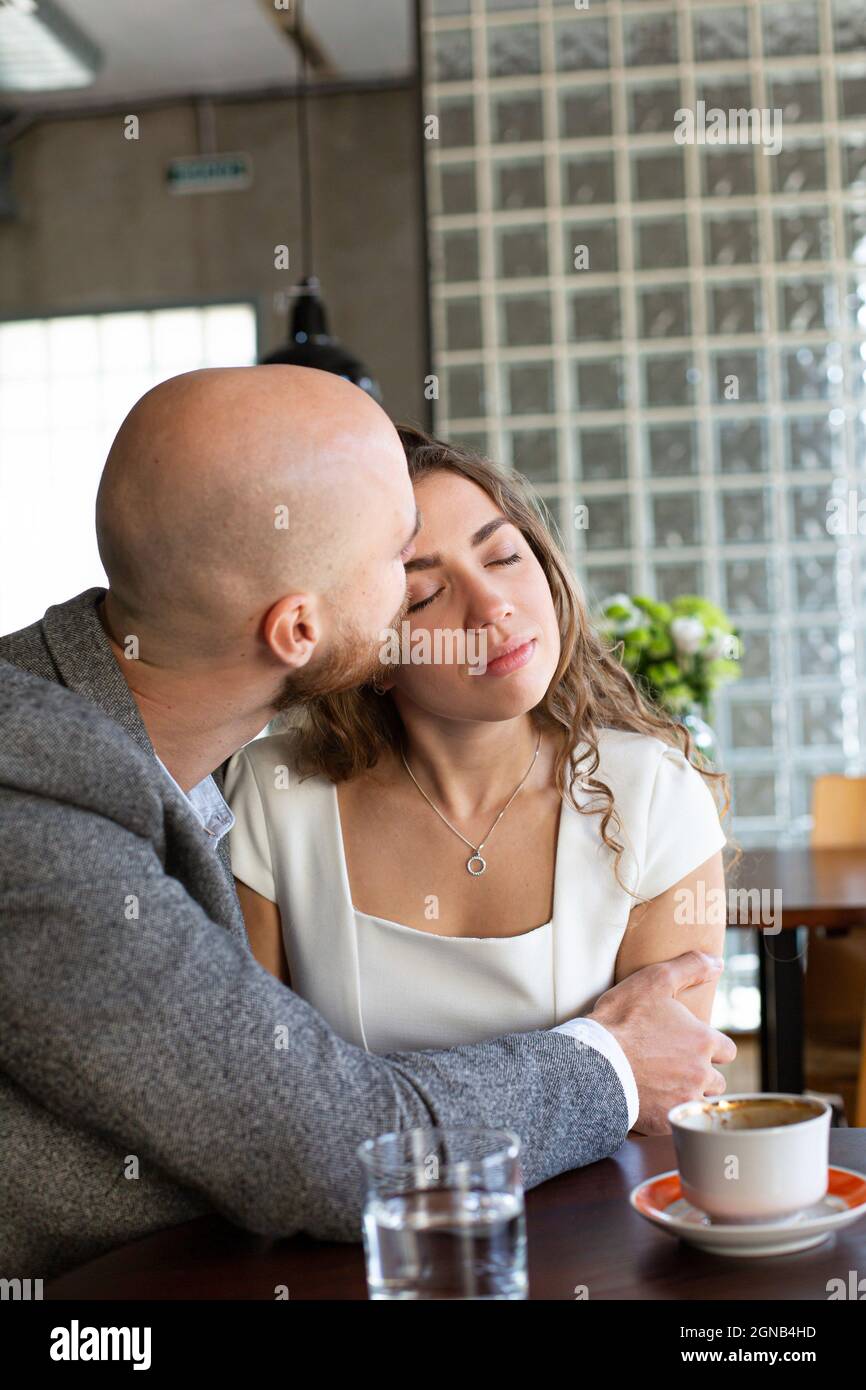Young white european married couple in the restaurant Stock Photo - Alamy