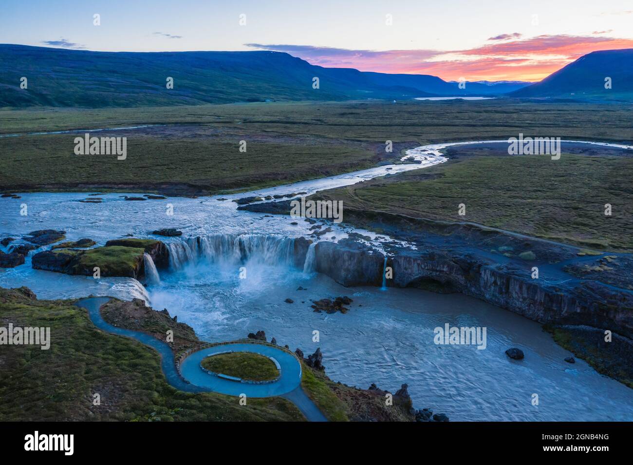 The aerial view of the beautiful waterfall of Godafoss at link sunset ...