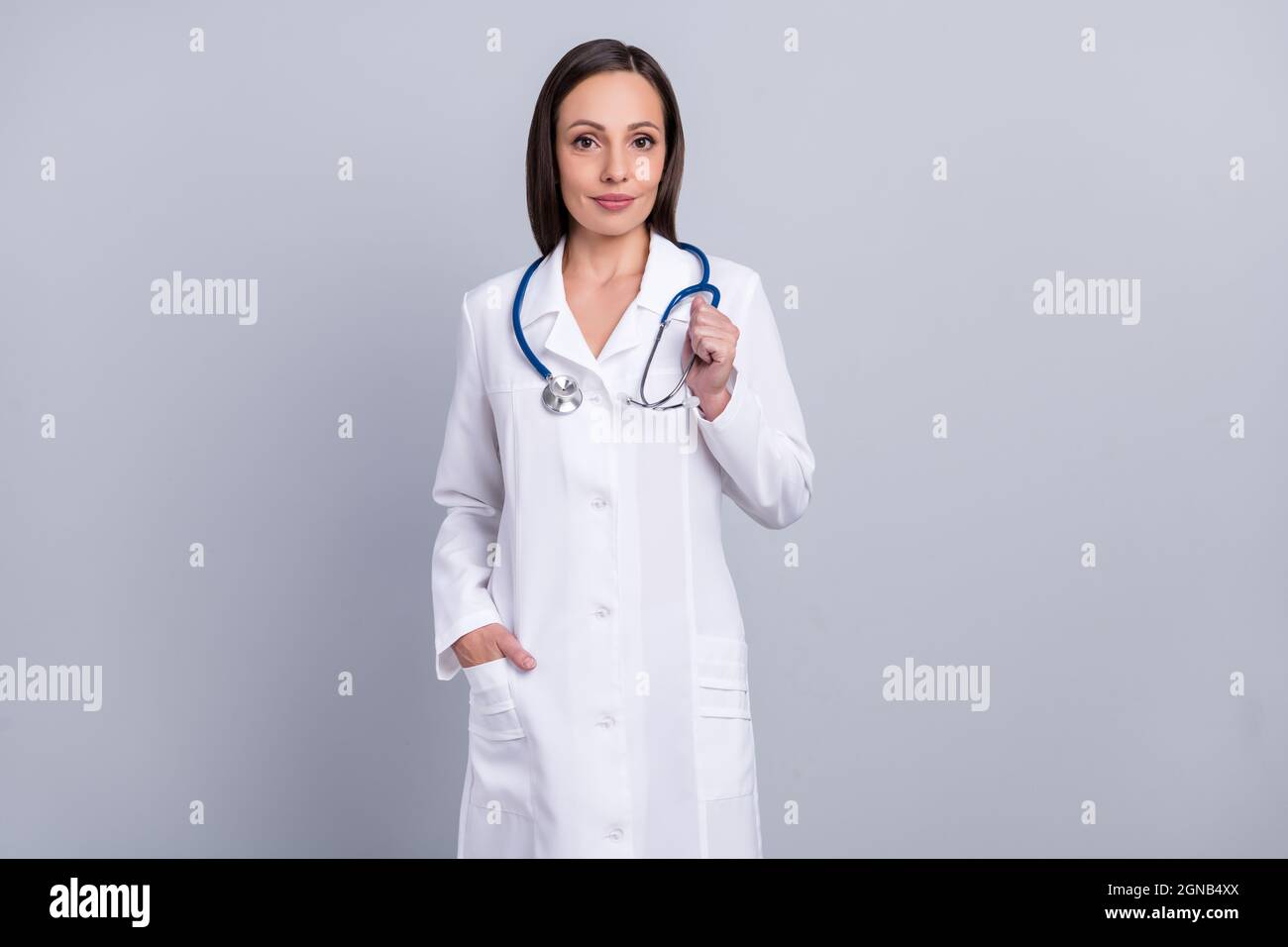 Photo of cute charming lady doctor wear white formal coat smiling ...