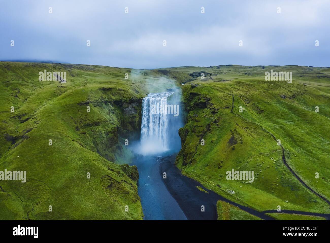 Aerial drone view of Skogafoss waterfall in Iceland, one of the most ...