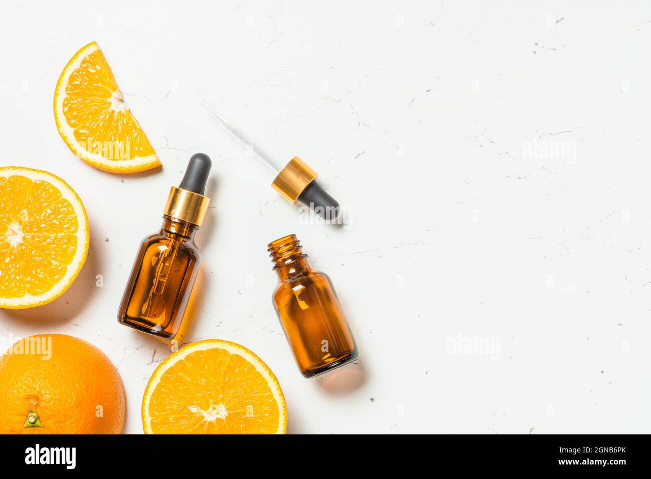 Vitamin C. Cosmetic products and fresh citrus fruits Stock Photo - Alamy