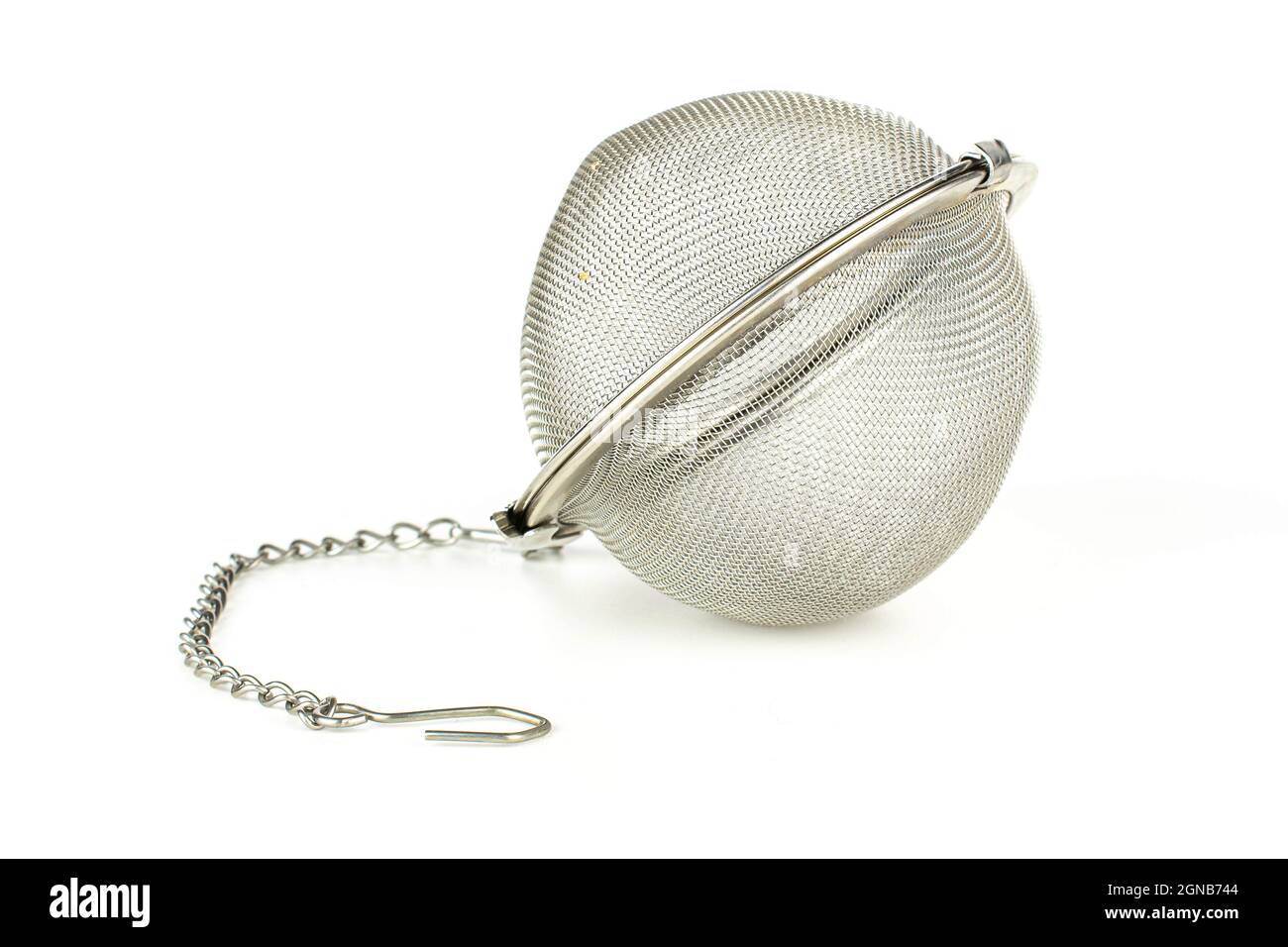 Globe tea infuser isolated on white background Stock Photo - Alamy