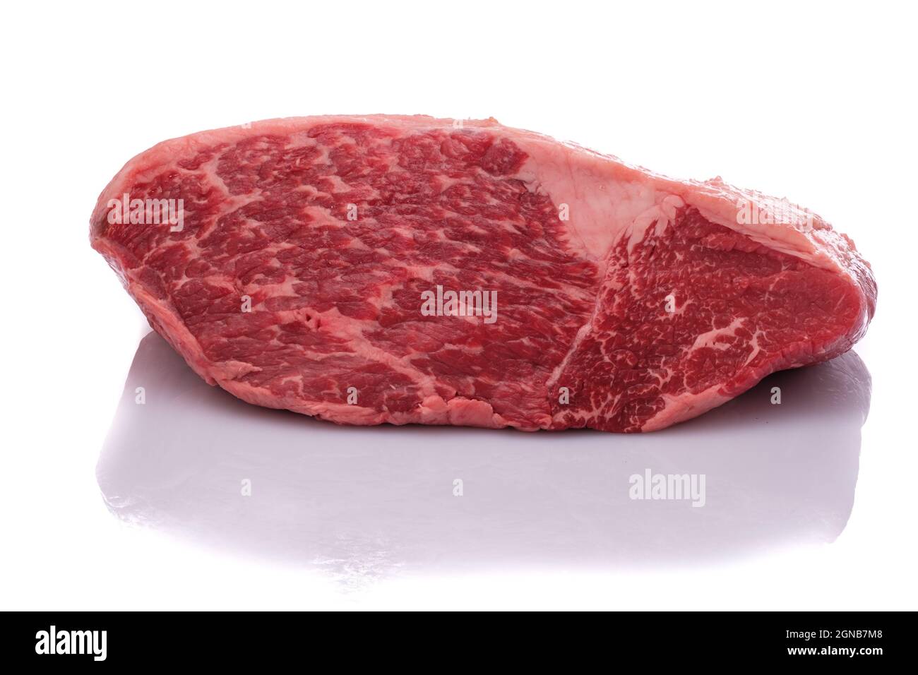 Closeup of raw wagyu roast beef from haunch isolated on a white ...