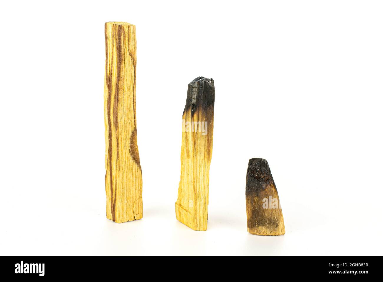 Group of three whole burnt palo santo stick isolated on white ...