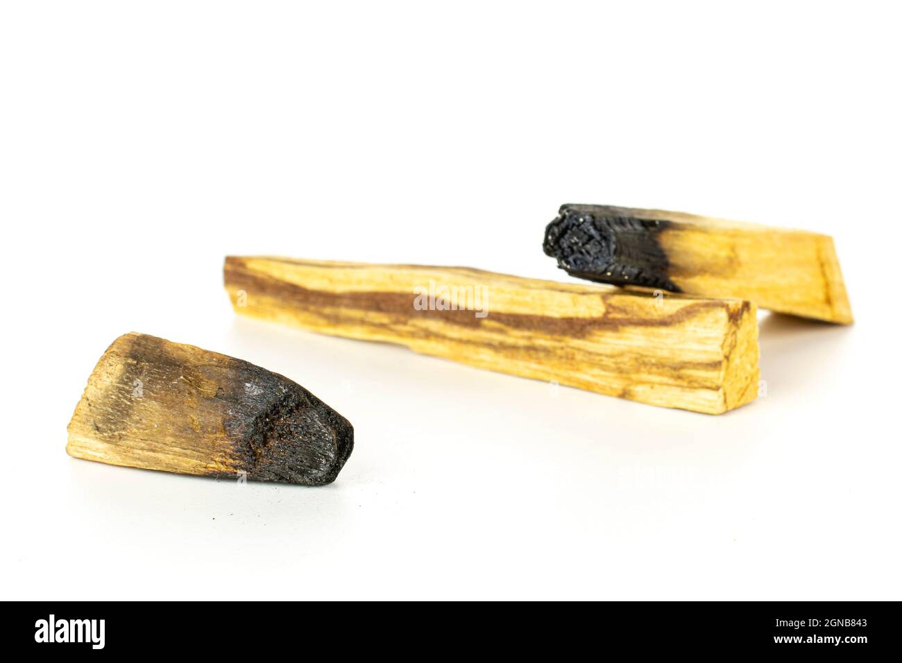 Group of three whole burnt palo santo stick isolated on white ...