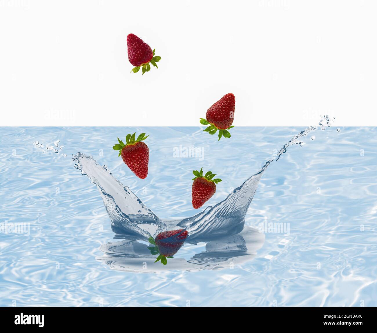 strawberries with water splash background Stock Photo - Alamy