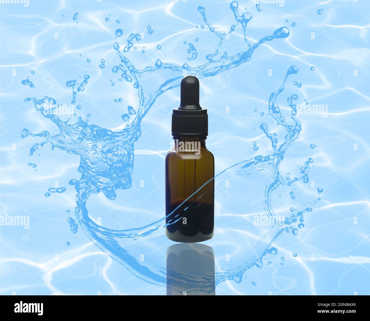 bottle with dropper with water splash background Stock Photo - Alamy