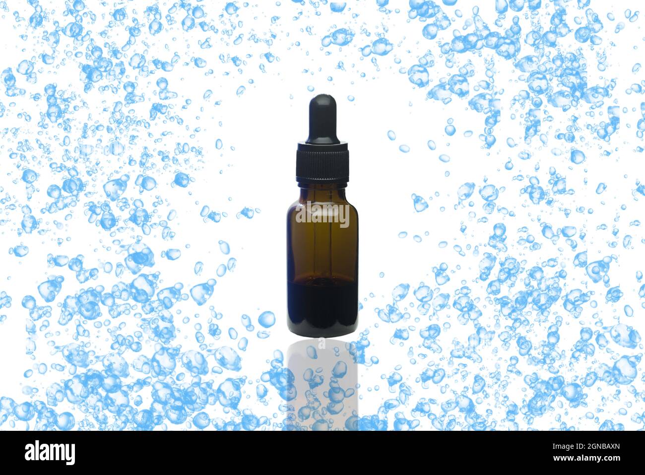 bottle with dropper with water drops background Stock Photo - Alamy