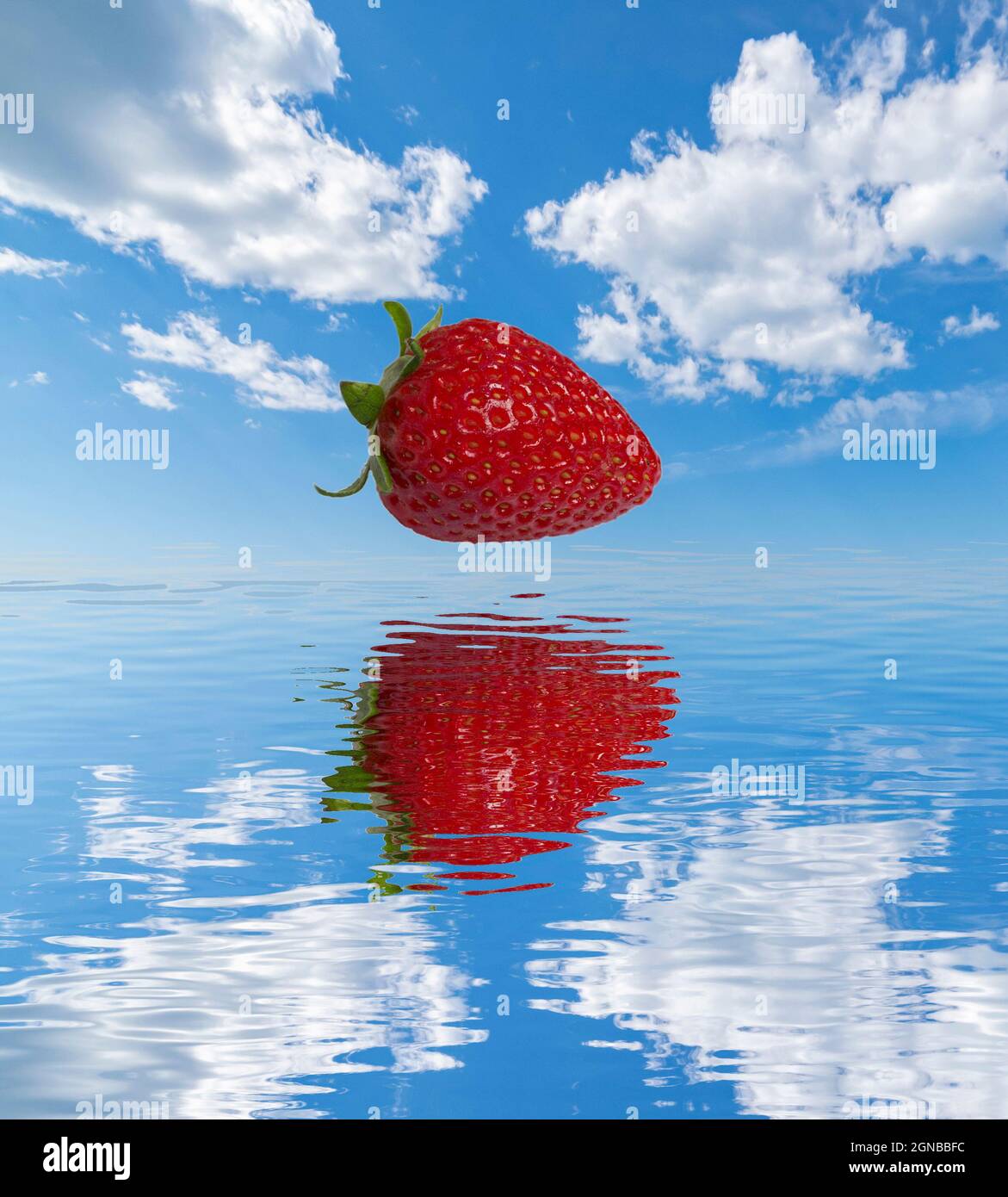 strawberry with sky and clouds background, reflected on water Stock ...
