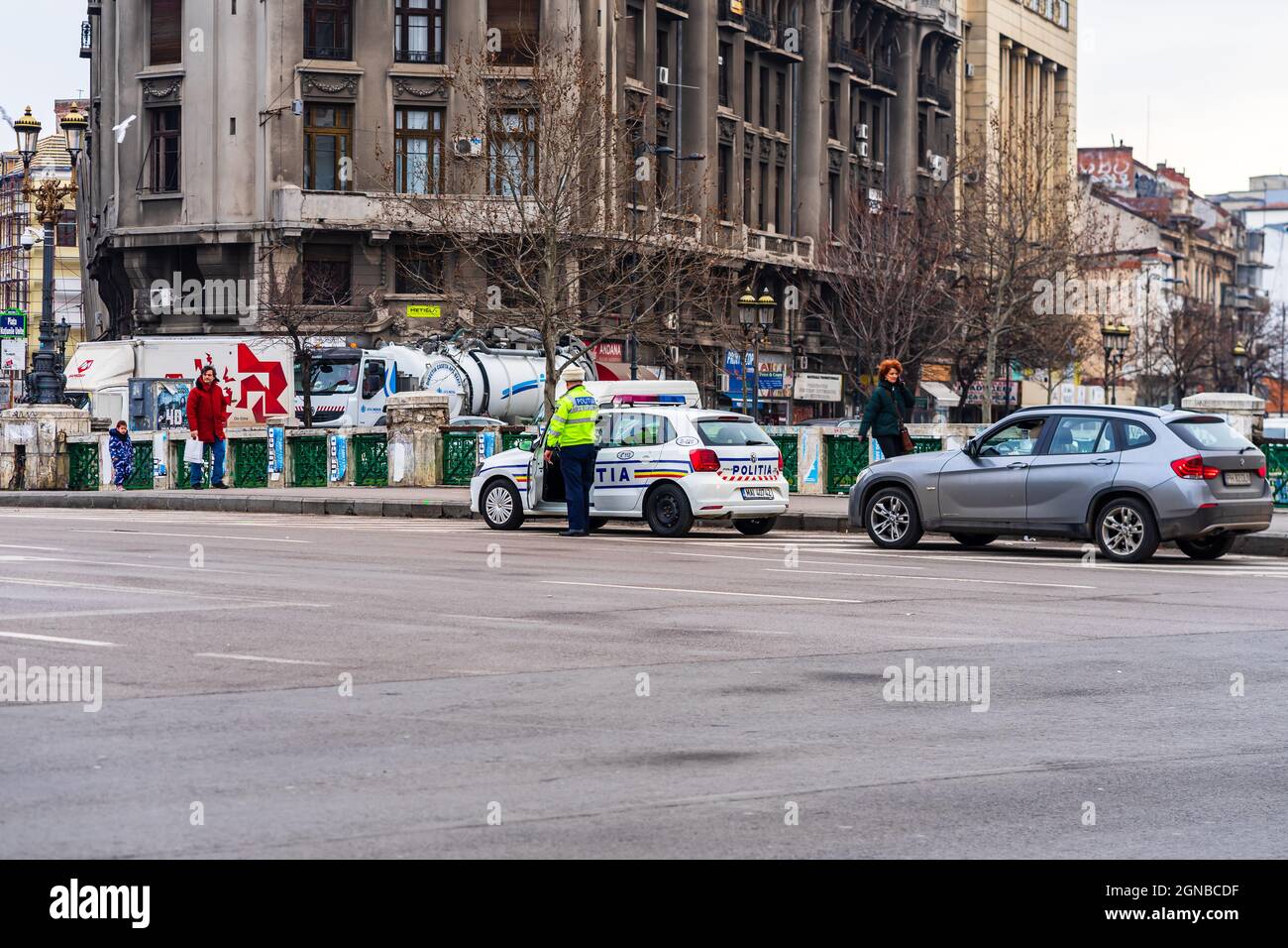 Romanian police (Politia Rutiera) car patrolling in downtown Bucharest ...