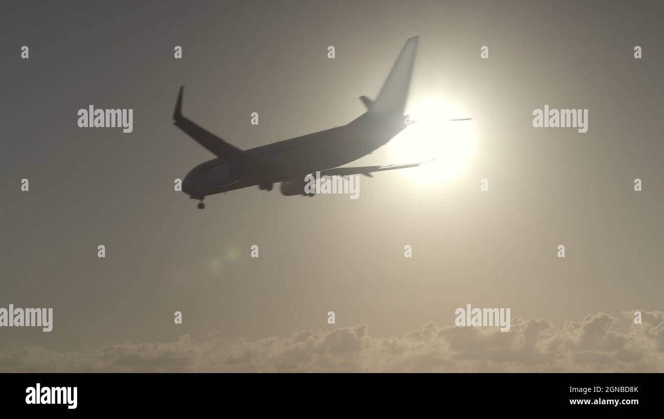 Plane flight against the sunlight Stock Photo - Alamy