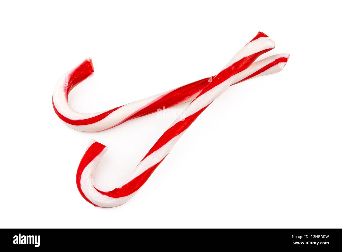 Two candy canes isolated on white background Stock Photo - Alamy