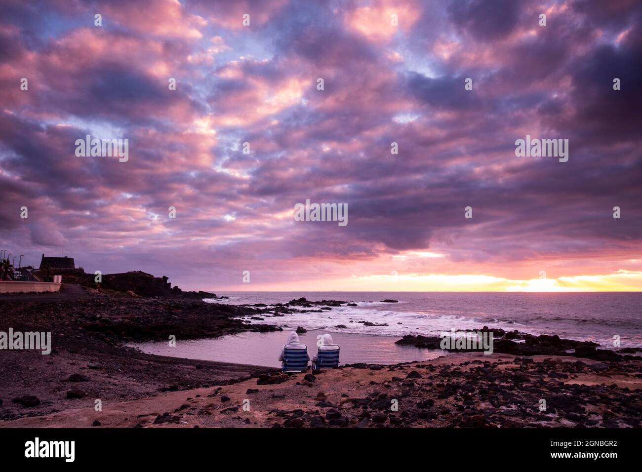 Sunset landscape at the beach with sea ocean and waves in background ...