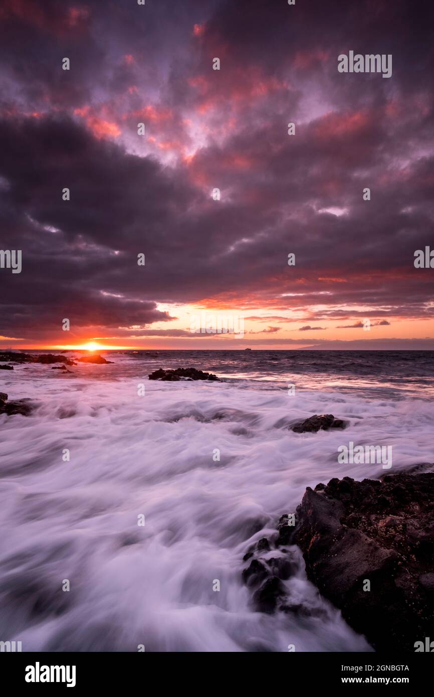 Sunset landscape at the beach with sea ocean and waves in background ...