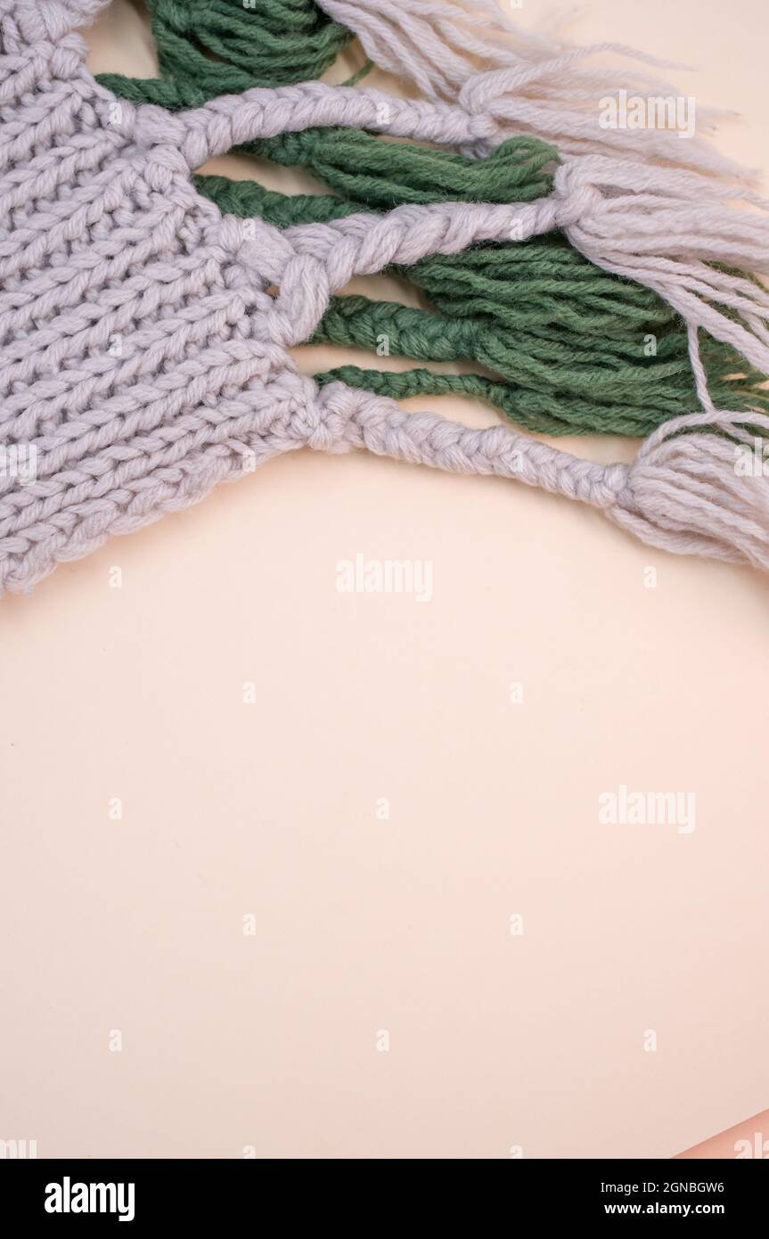 knitted soft natural wool on a beige background Stock Photo - Alamy