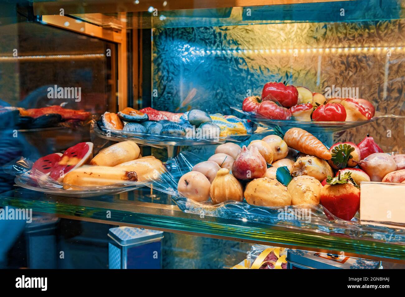 marzipan fruit on display. Marzipan assortment. Sweet marzipan with ...