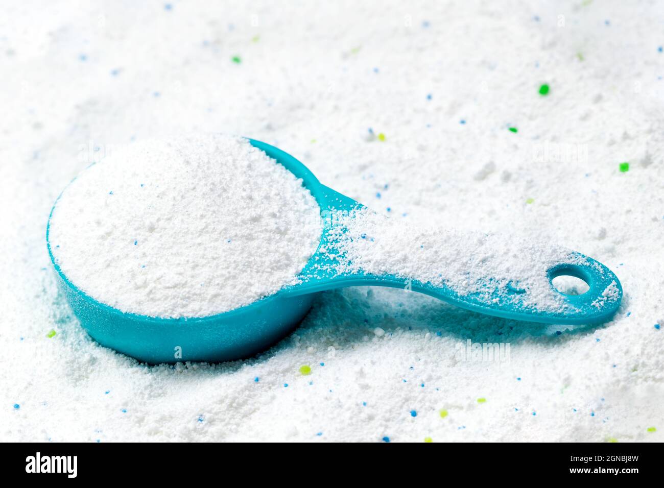 Scoop of washing powder hi-res stock photography and images - Alamy