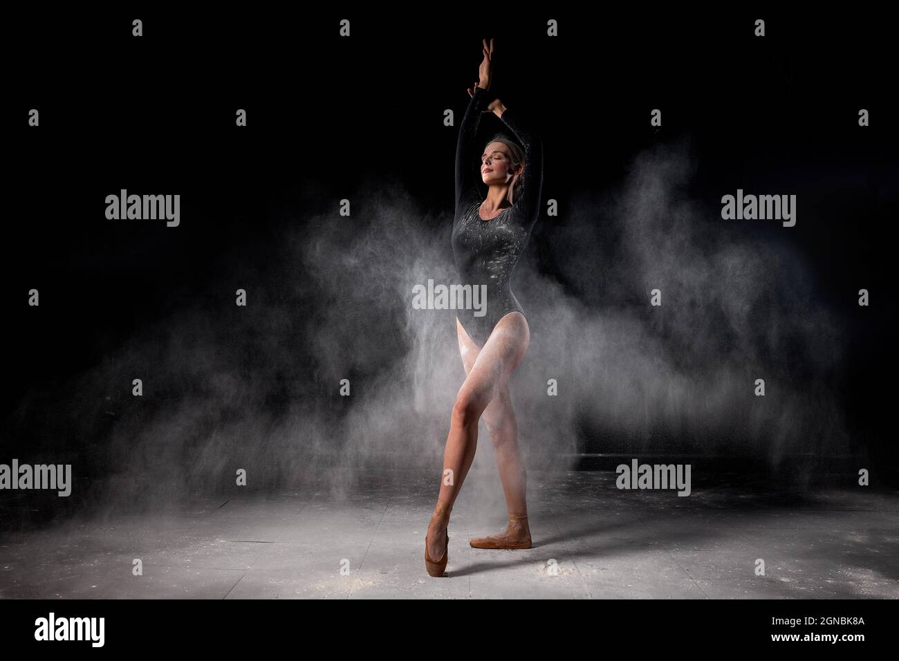 Dramatic portrait of strong and talented female dancer with white ...