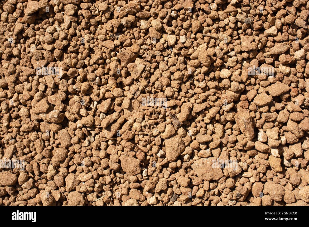 Closeup shot of brown dry laterite soil in the sun Stock Photo - Alamy