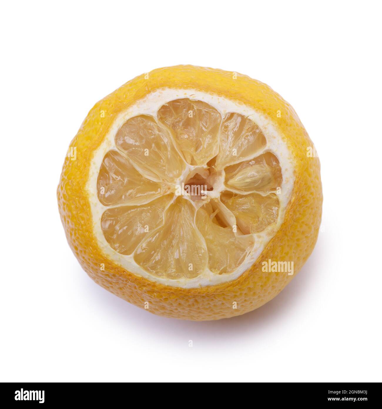 Slice of bad dry lemon isolated over white background Stock Photo - Alamy