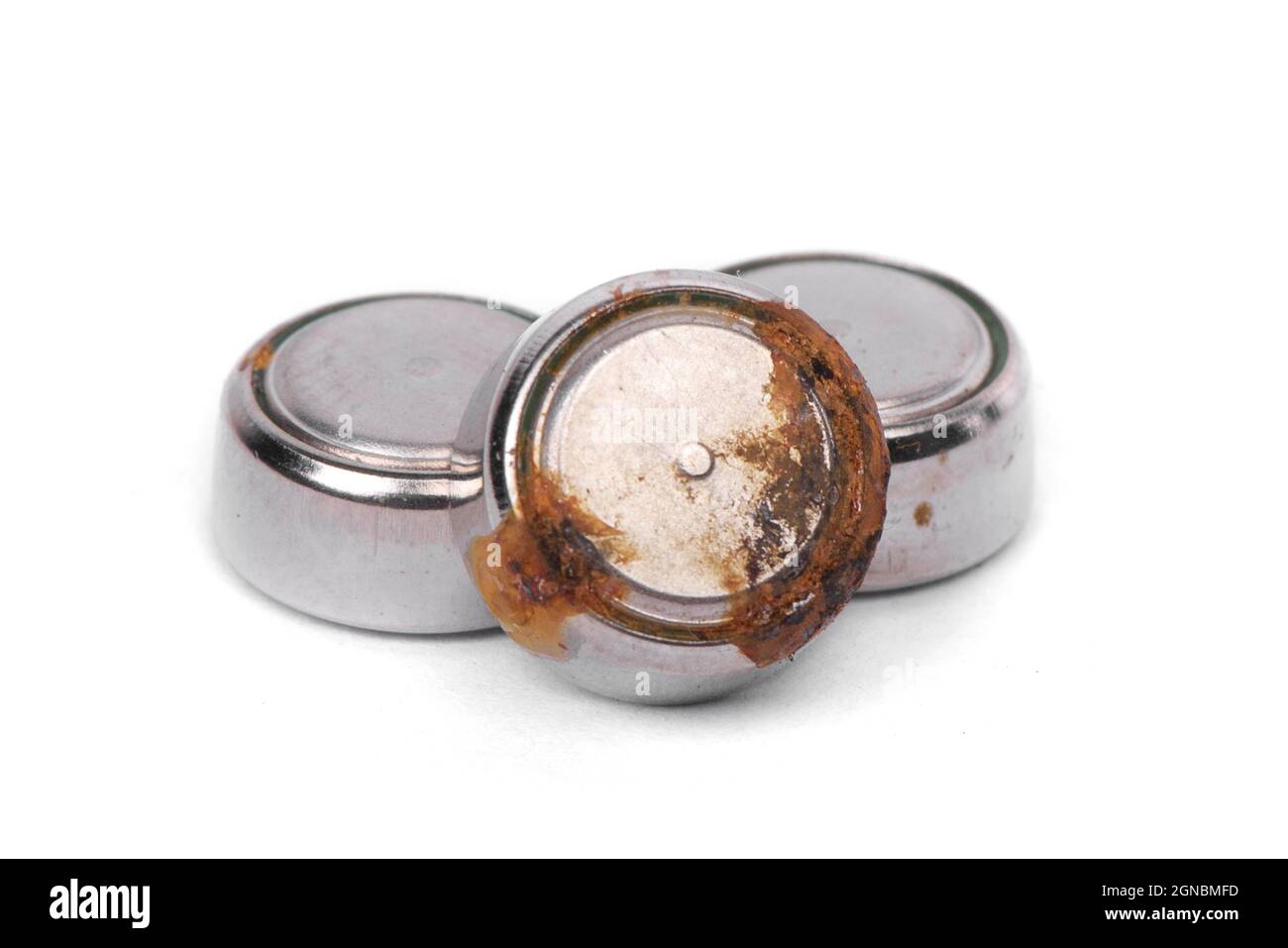 Group of small watch rusty batteries isolated on white background Stock ...