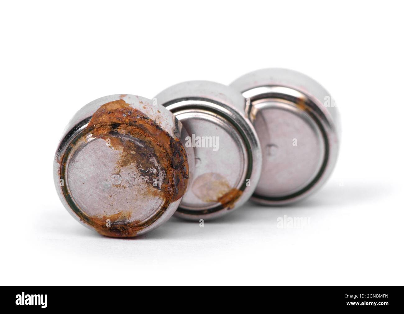 Group of small watch rusty batteries isolated on white background Stock ...