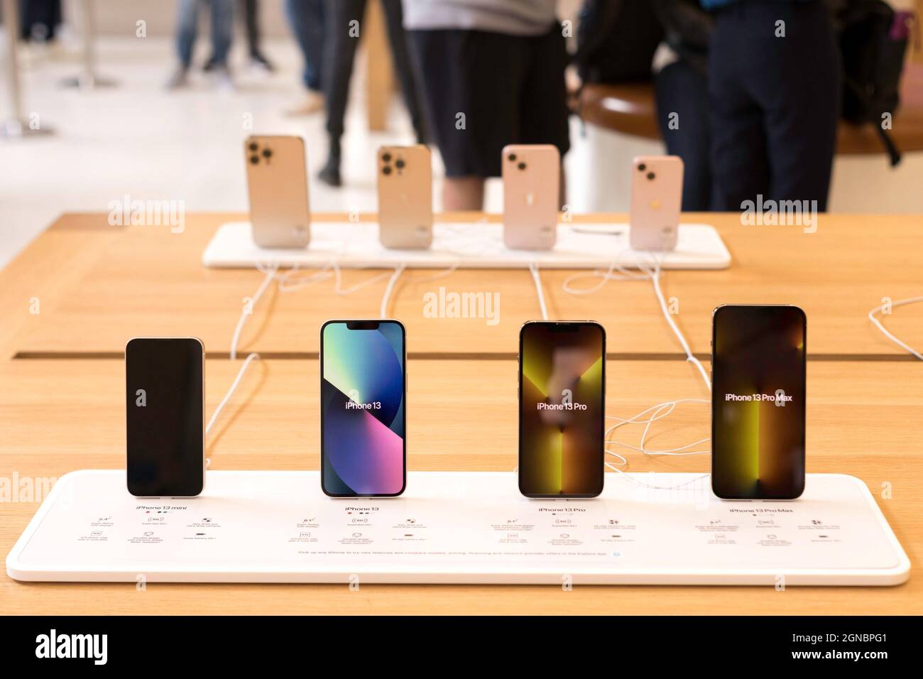 Various models of iPhone 13 seen displayed at the Apple store on Regent ...