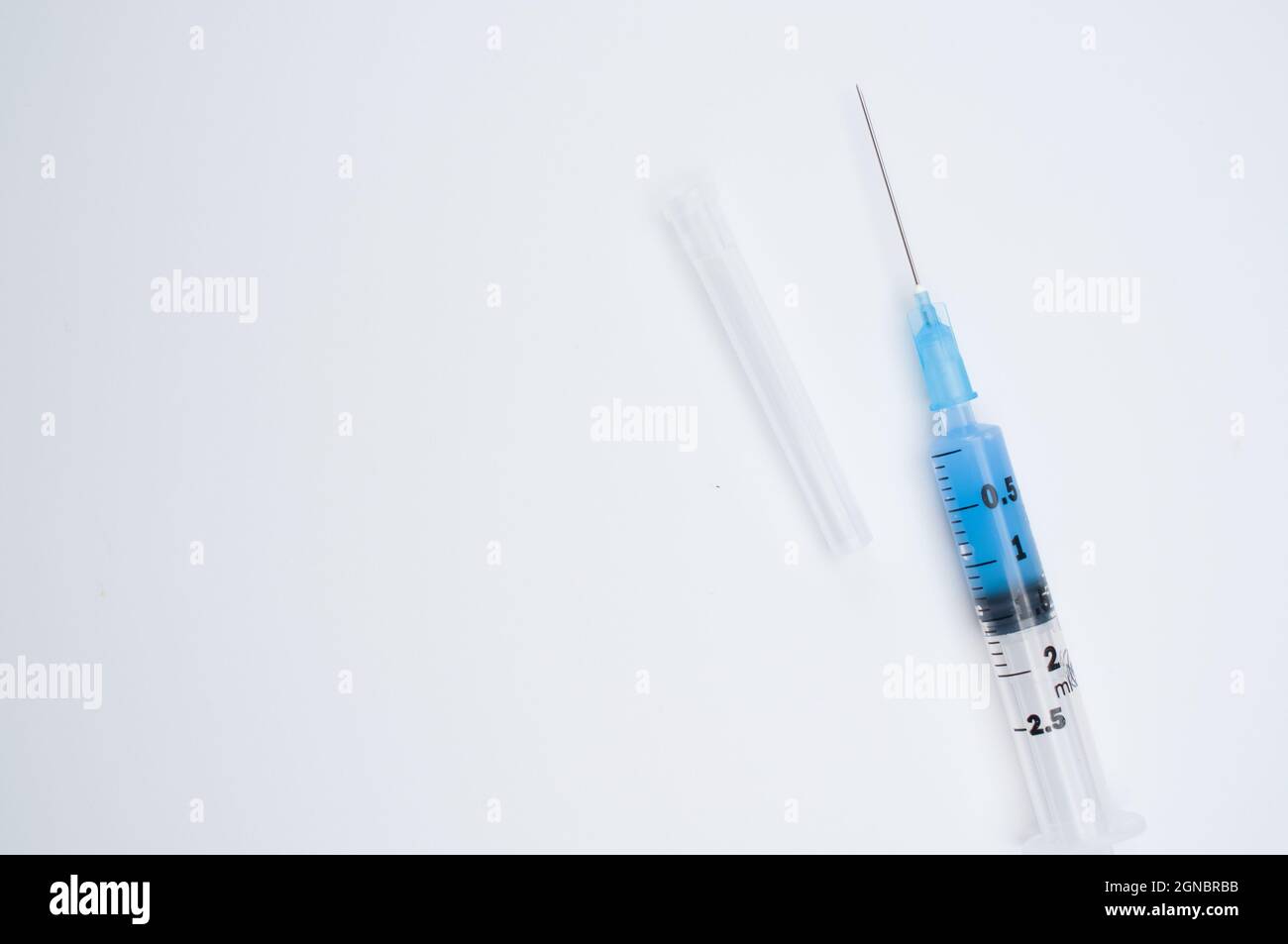 isolated sterilized injection syringe on a white background Stock Photo ...