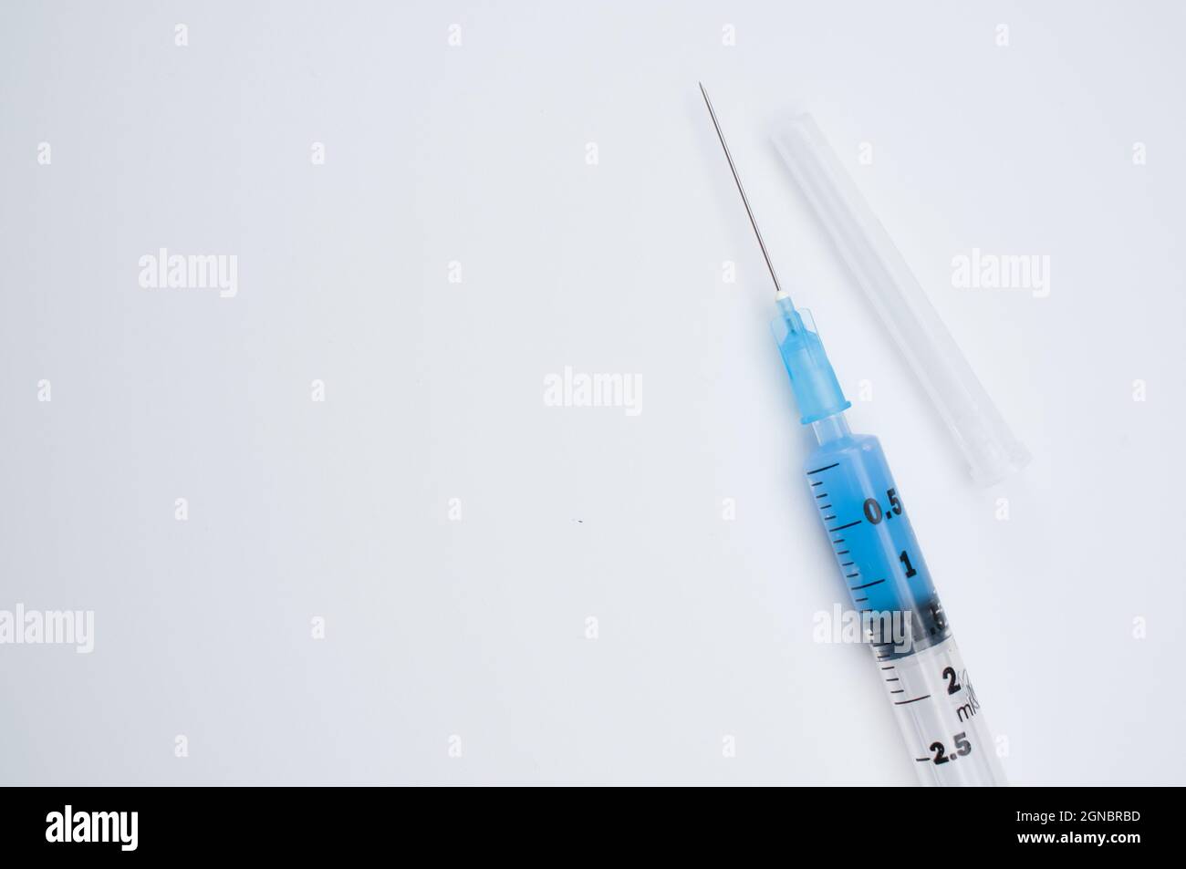 isolated sterilized injection syringe on a white background Stock Photo ...