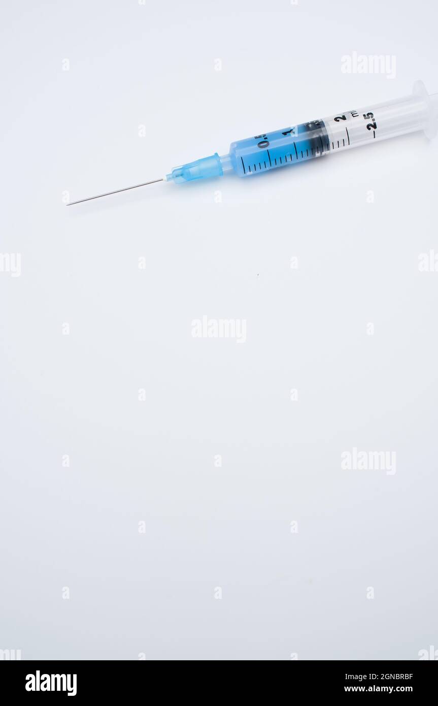 isolated sterilized injection syringe on a white background Stock Photo ...