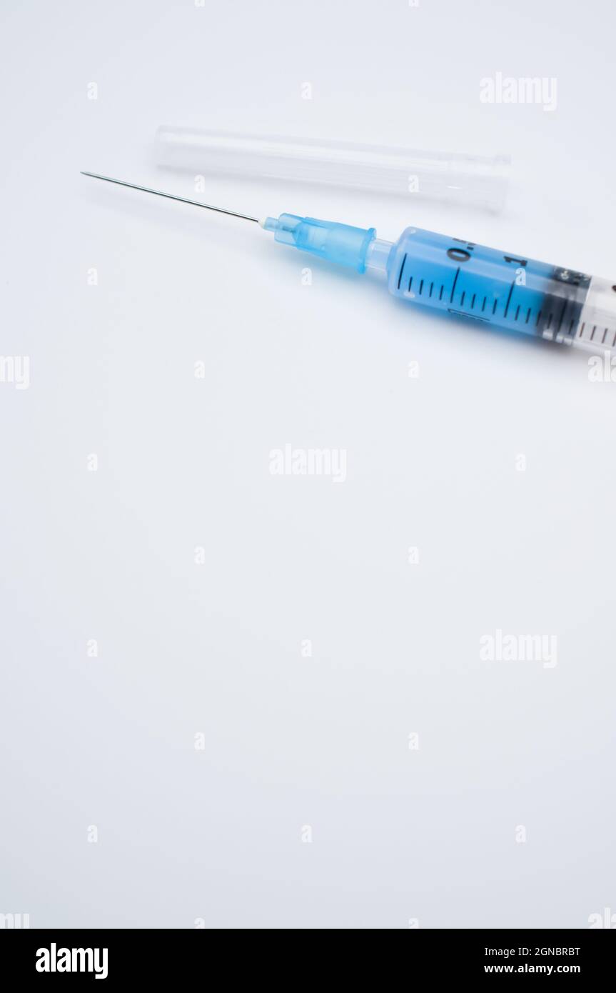 isolated sterilized injection syringe on a white background Stock Photo ...