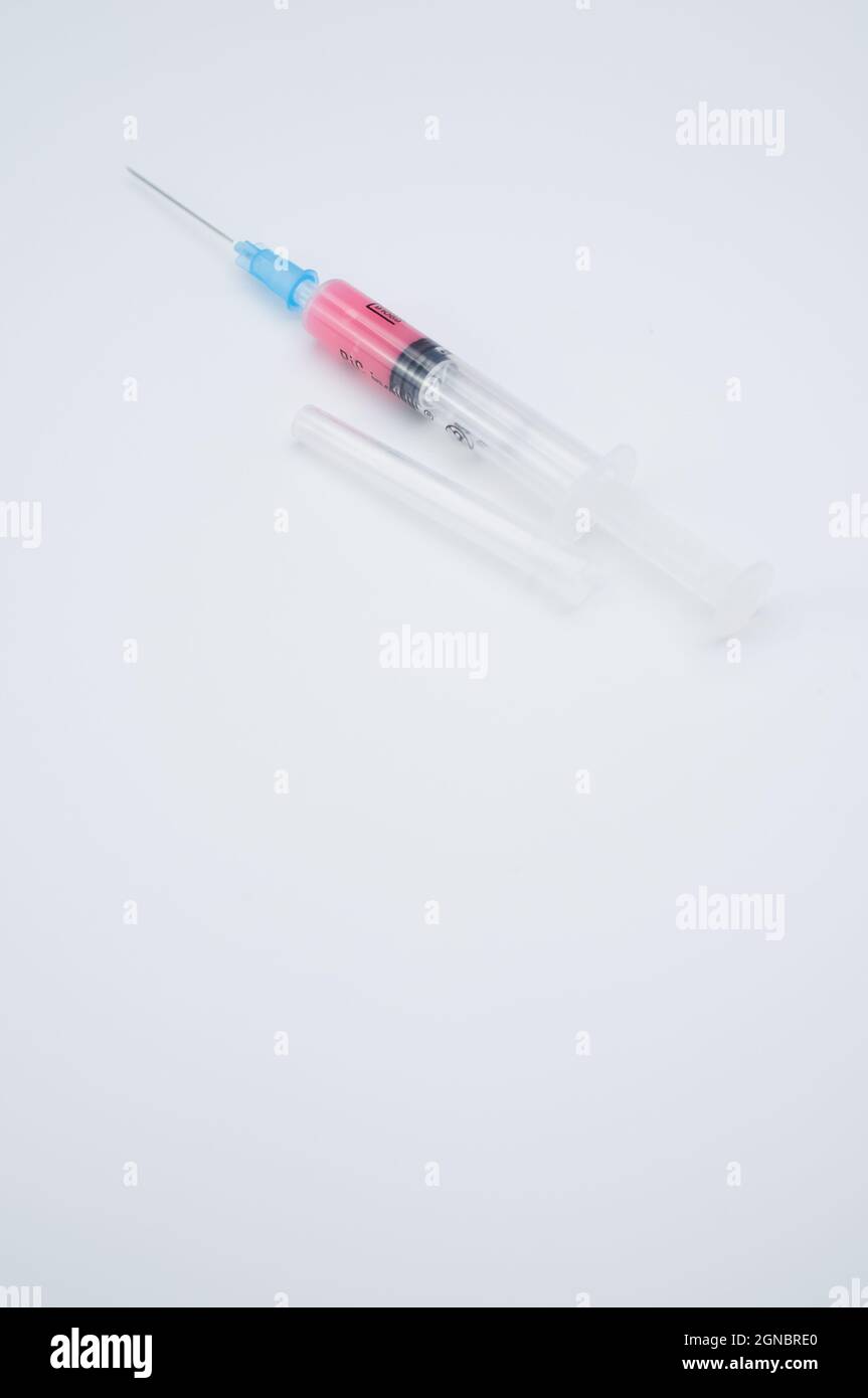isolated sterilized injection syringe on a white background Stock Photo ...