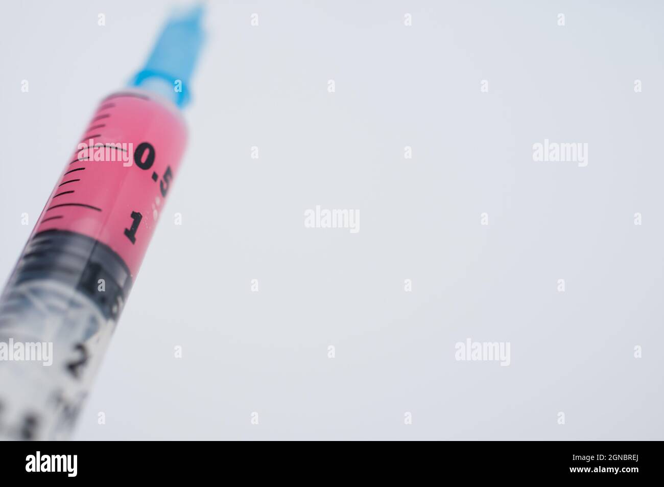isolated sterilized injection syringe on a white background Stock Photo ...