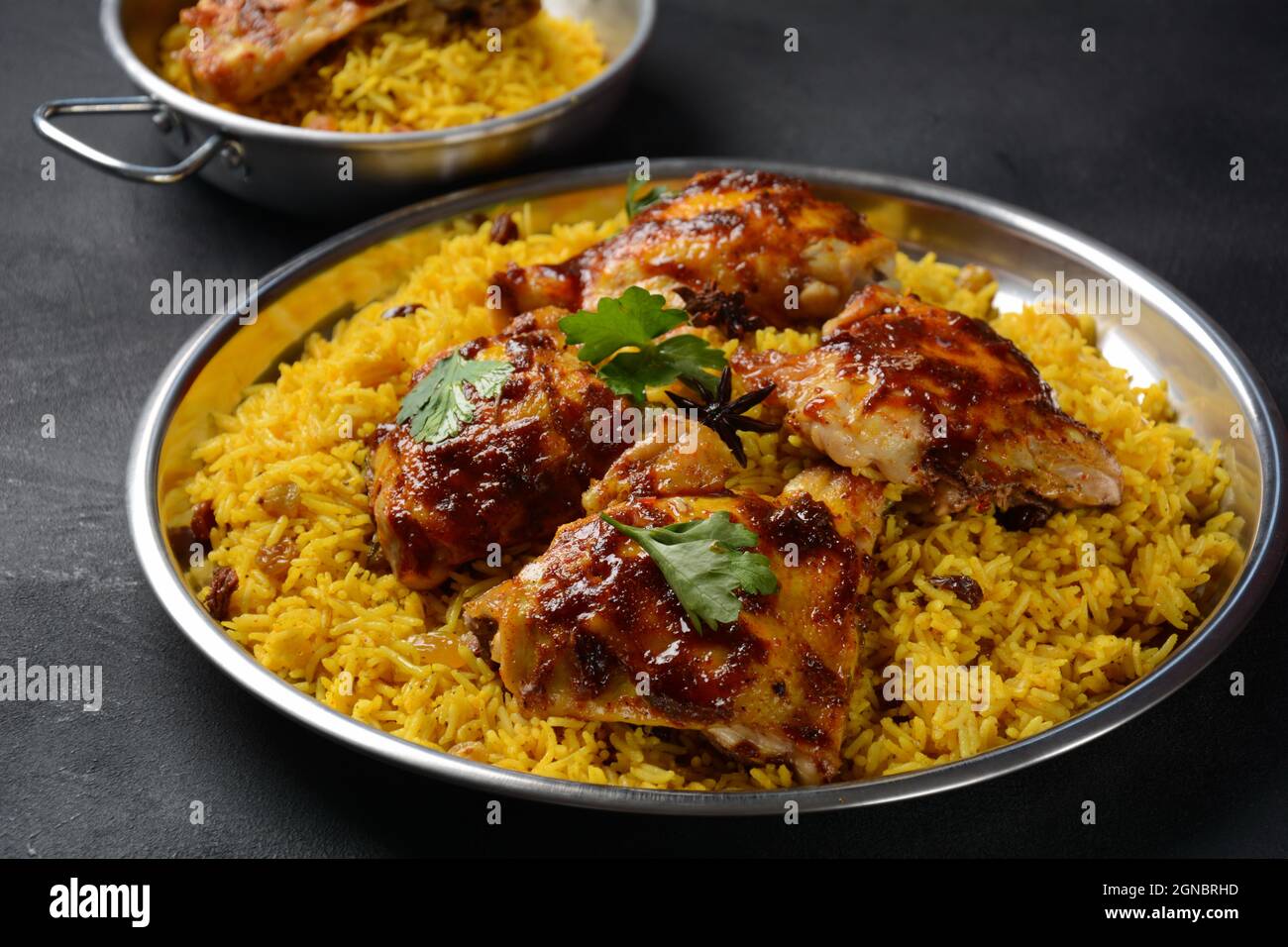 The national Saudi Arabian dish chicken kabsa with roasted chicken ...