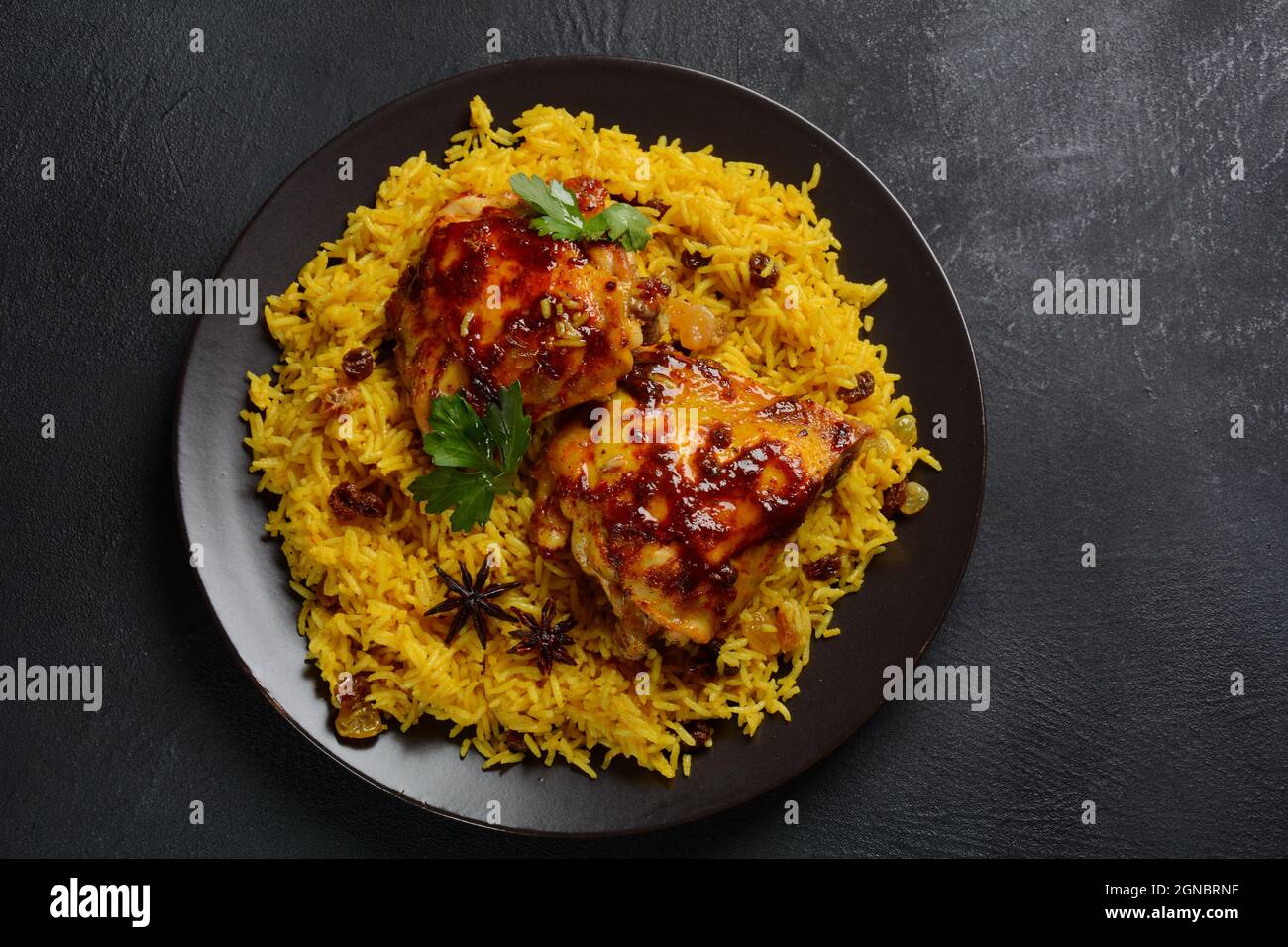 The national Saudi Arabian dish chicken kabsa with roasted chicken ...